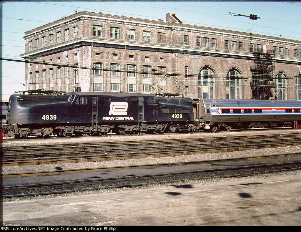 Penn Central GG-1 4939 powers new Amfleet Consist - 1976